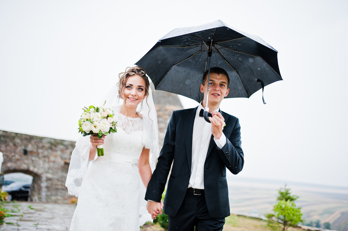 What To Do If It Rains On Your Wedding Day (8 Tips) - Warble Entertainment
